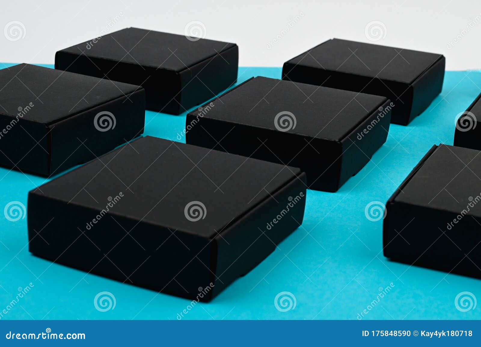 Black Cubes Side View. Black Boxes on Blue. Black Boxes on a Blue ...