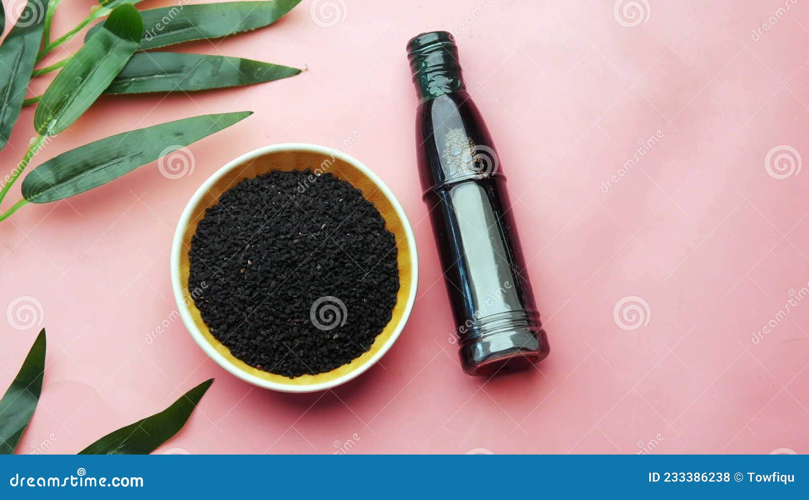 Black Cumin in a Container with Oil in a Jar on Pink Stock Footage ...