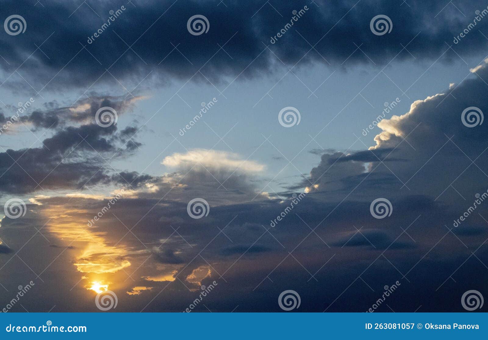 The Black and Dark Red Clouds Under the Sunlight Looked Emotional ...