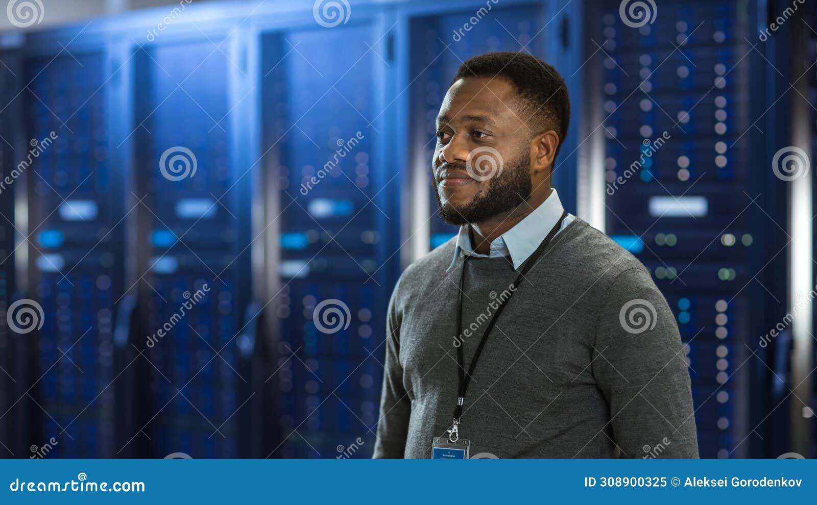 Black Data Center it Technician Standing in the Middle of a Server Rack ...
