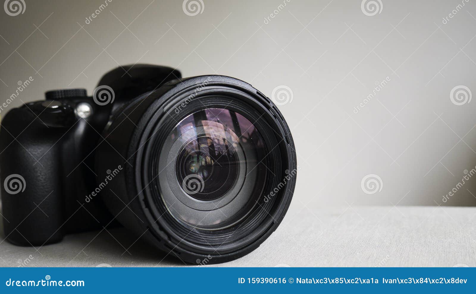 Black Digital Camera Isolated on a Light Background Stock Photo - Image ...
