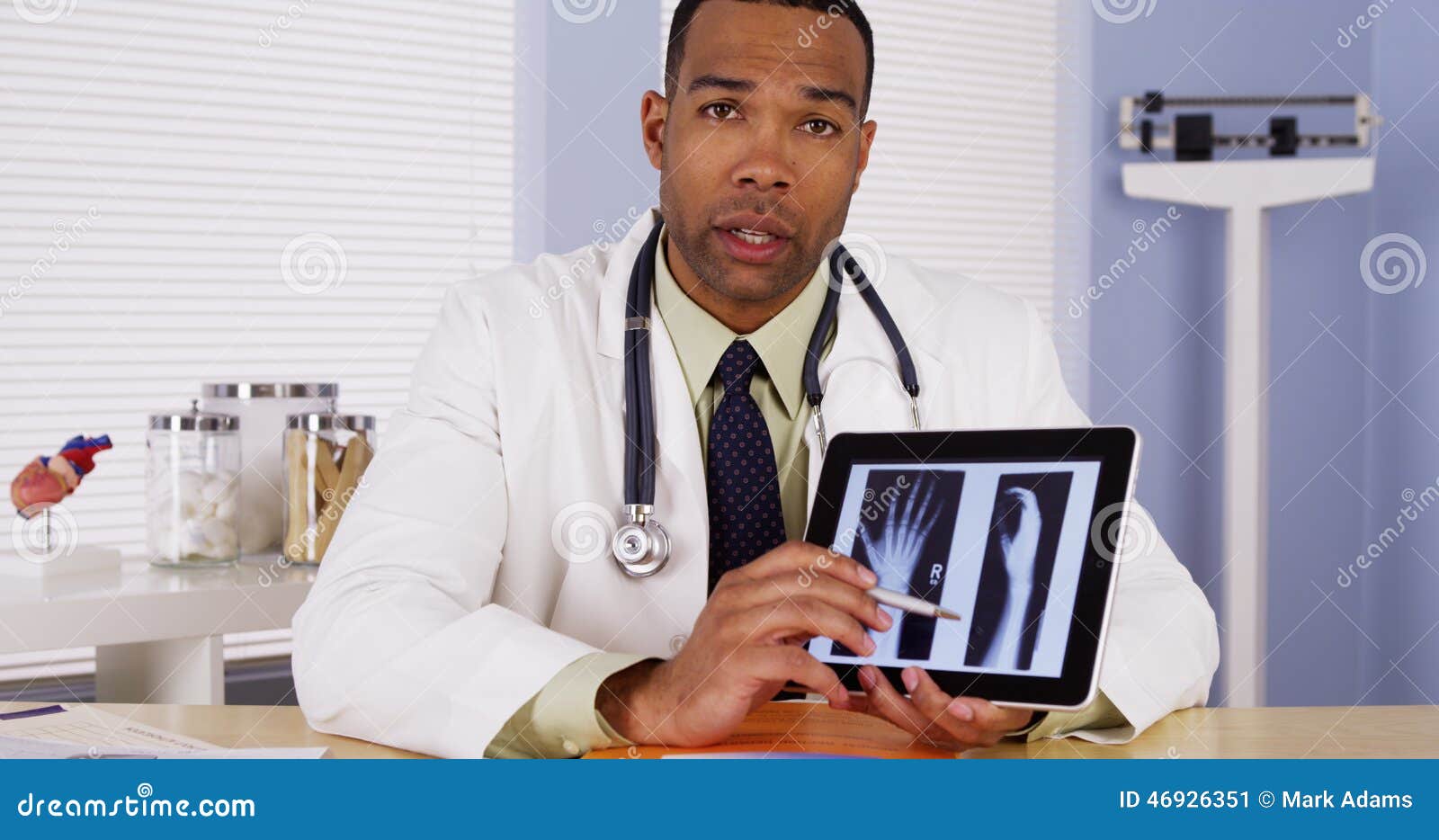 Black Doctor Listening and Talking To Camera Stock Image - Image of ...