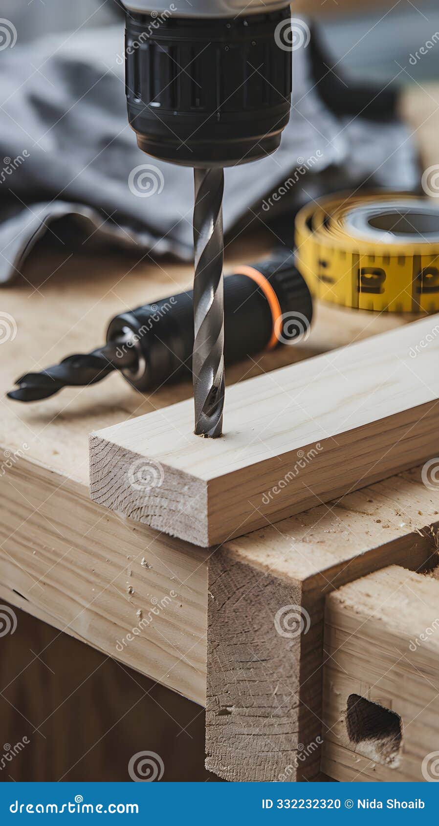 Black Drill Bit on Workbench, Yellow Measuring Tape, Workshop Setting ...