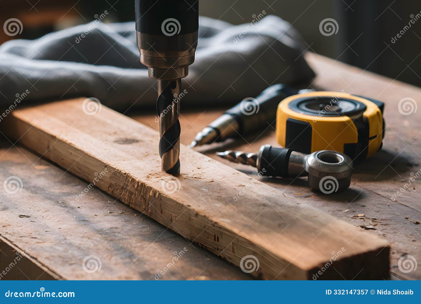 Black Drill Bit on Workbench, Yellow Measuring Tape, Workshop Setting ...