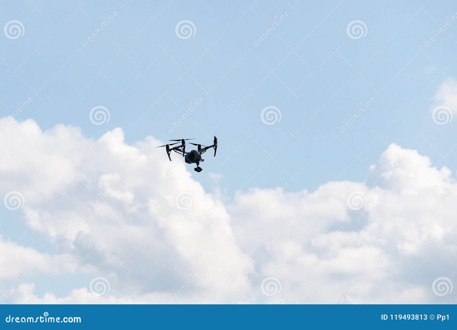 Black Drone Camera Flying in Clouds Blue Heaven Sun Stock Image - Image ...