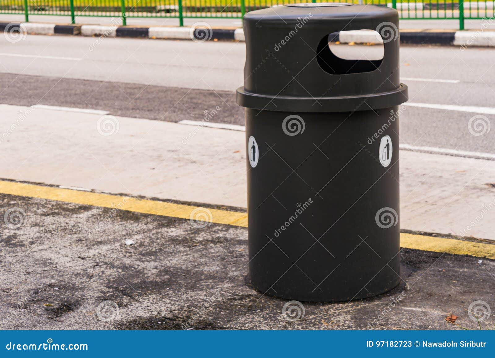 Black Dustbin or Trashcan beside the Road Stock Image - Image of trash ...