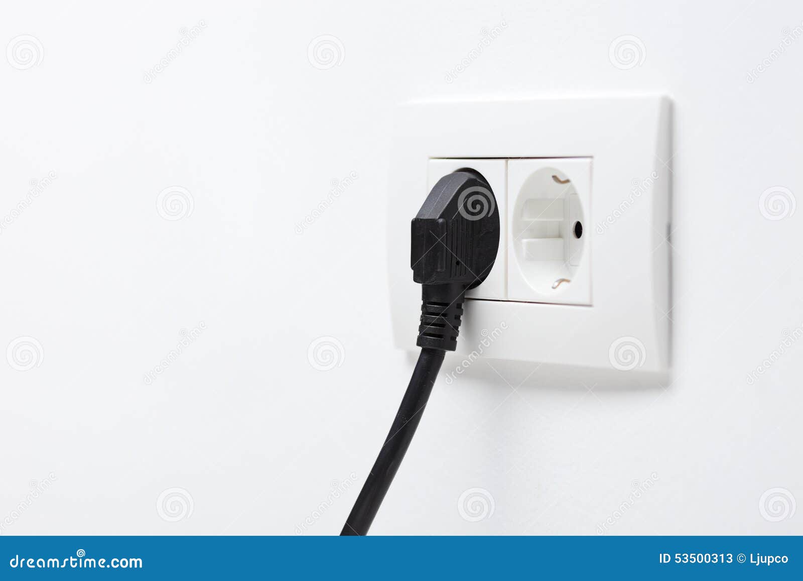 Black Electric Cord Plugged into a Socket Stock Image - Image of ...