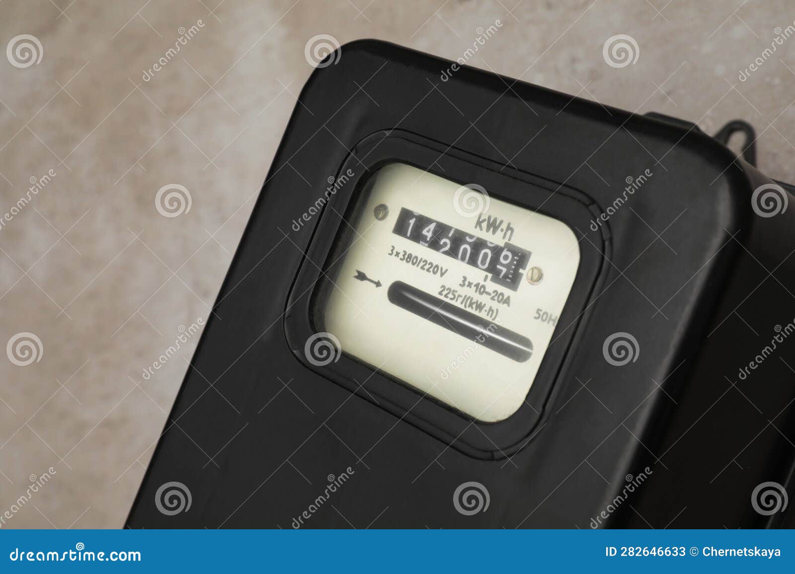 Black Electric Meter on Grey Background, Closeup. Measuring Device ...