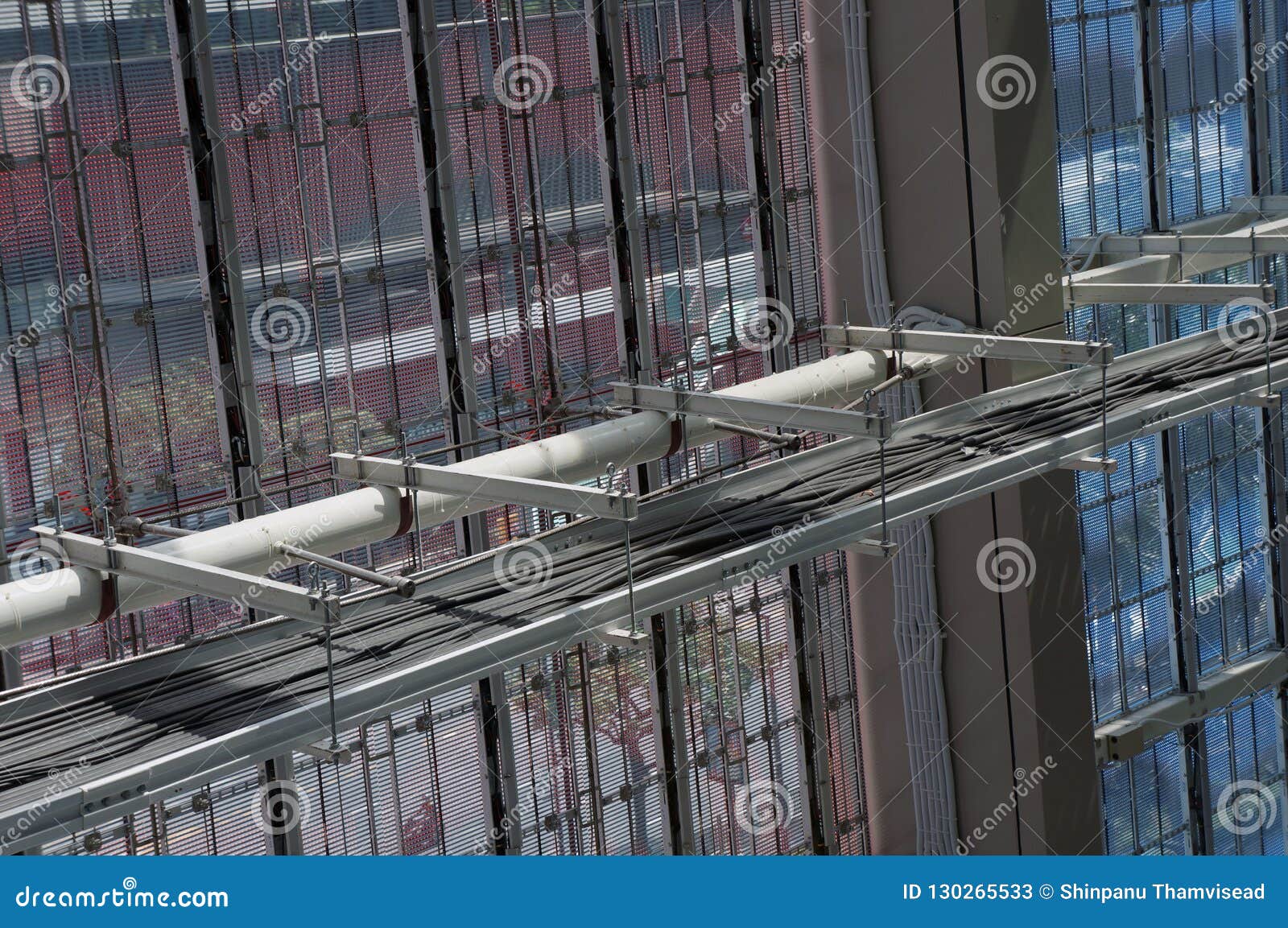 Black Electric Wire Stacked on Metal Rail Inside the Building. Stock ...