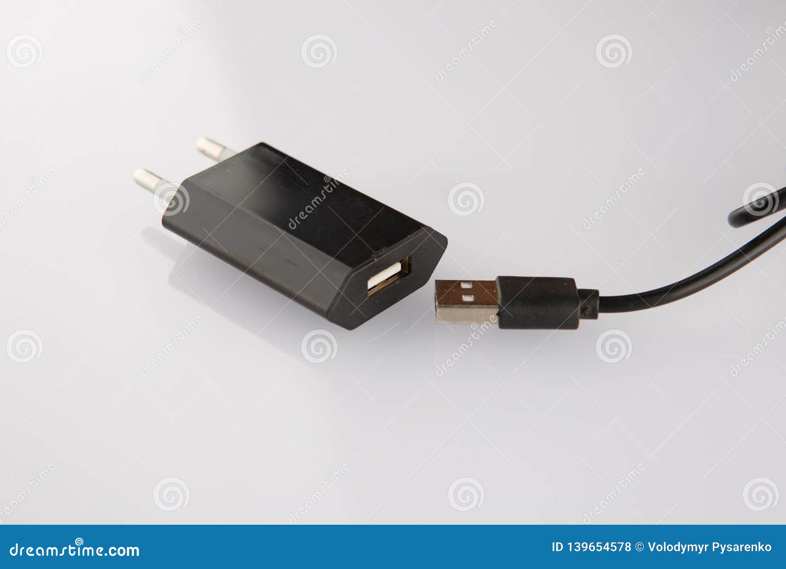 Black Electrical Adapter To USB Port on a White Background Stock Photo ...