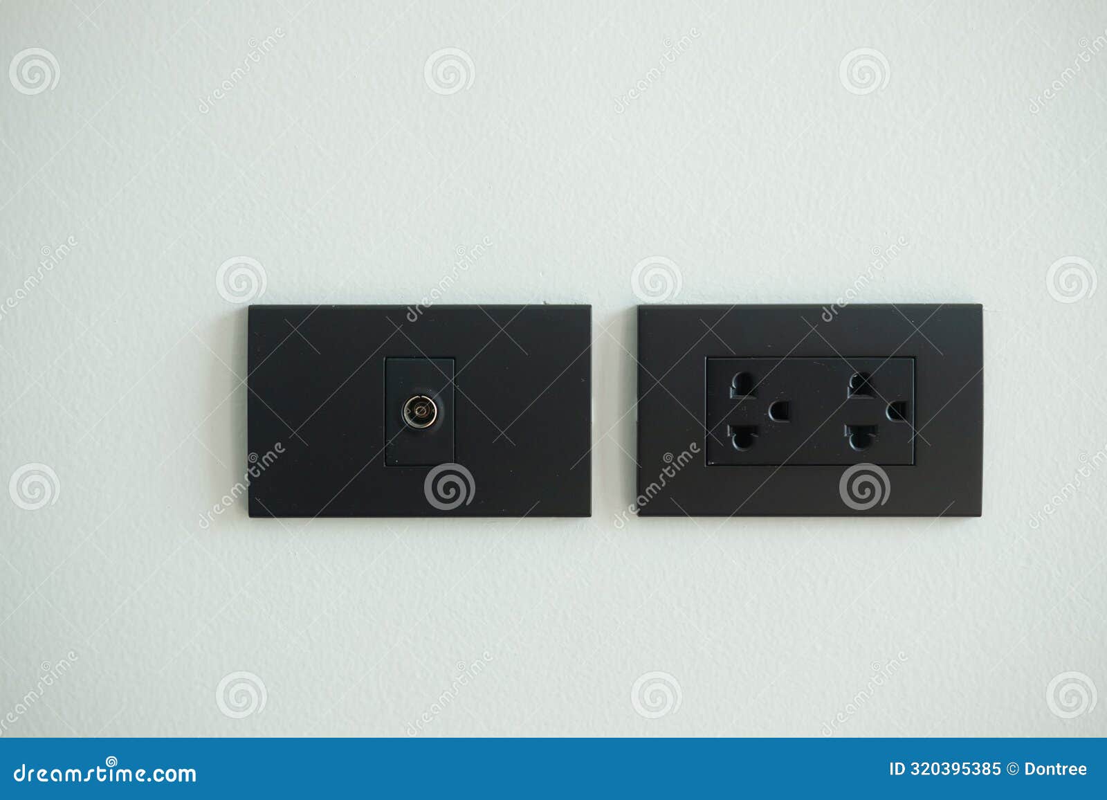 Black Electrical Outlet and Inserts the Antenna Cable To the TV Outlet ...