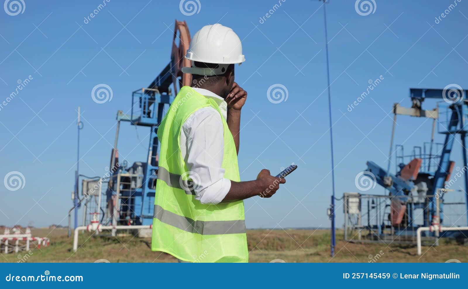 Black Engineer Controls Development of Oil by Jack-pump Stock Video ...