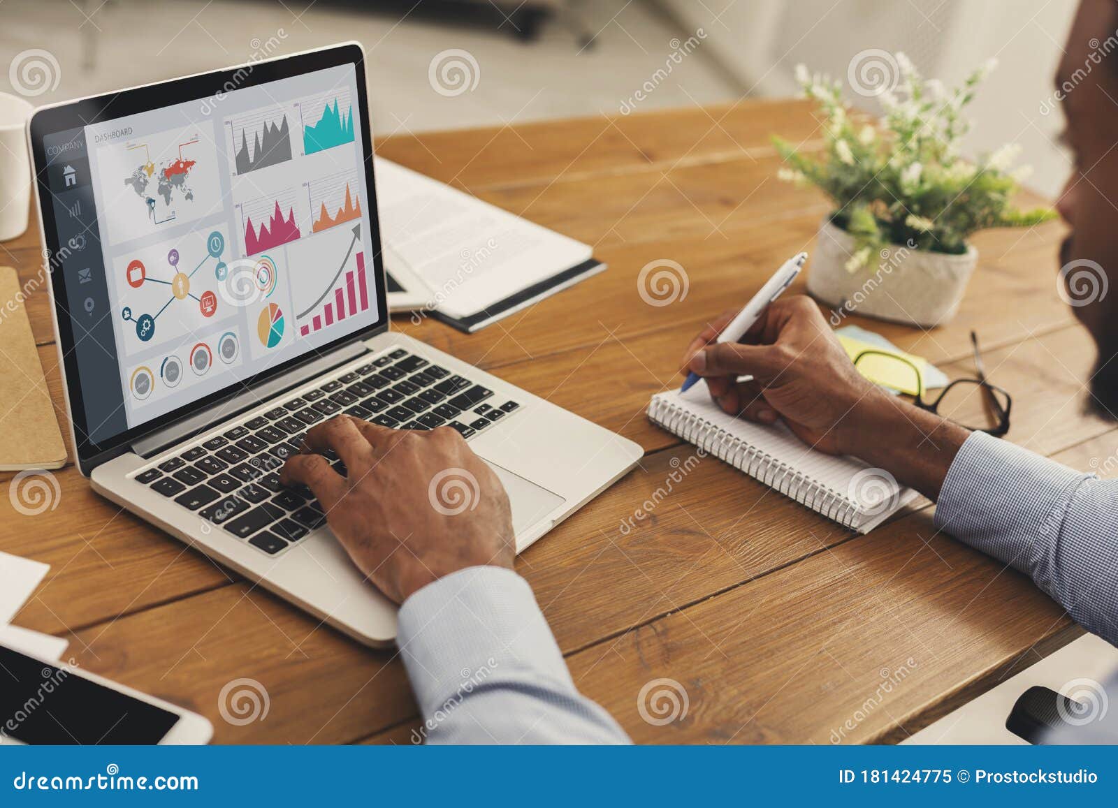 Black Entrepreneur Analyzing Graph on Laptop at Workplace Stock Image ...