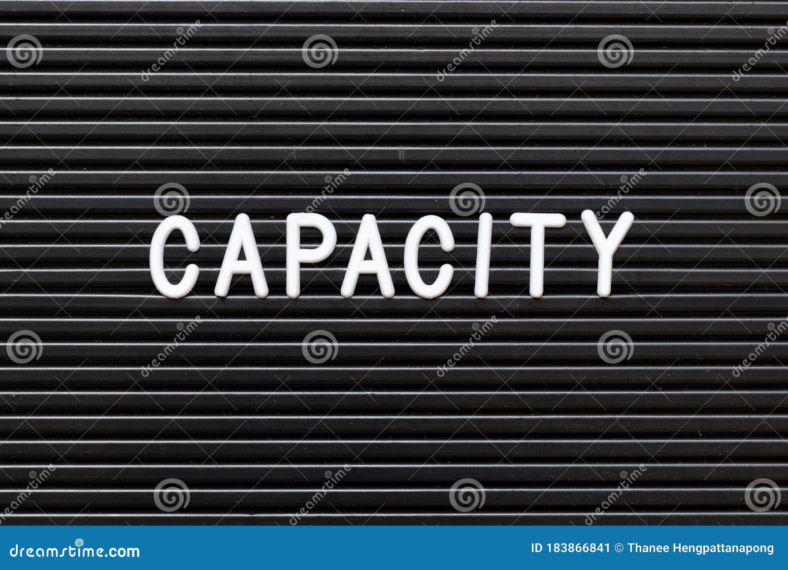 Black Felt Board With White Alphabet In Word Capacity Background ...