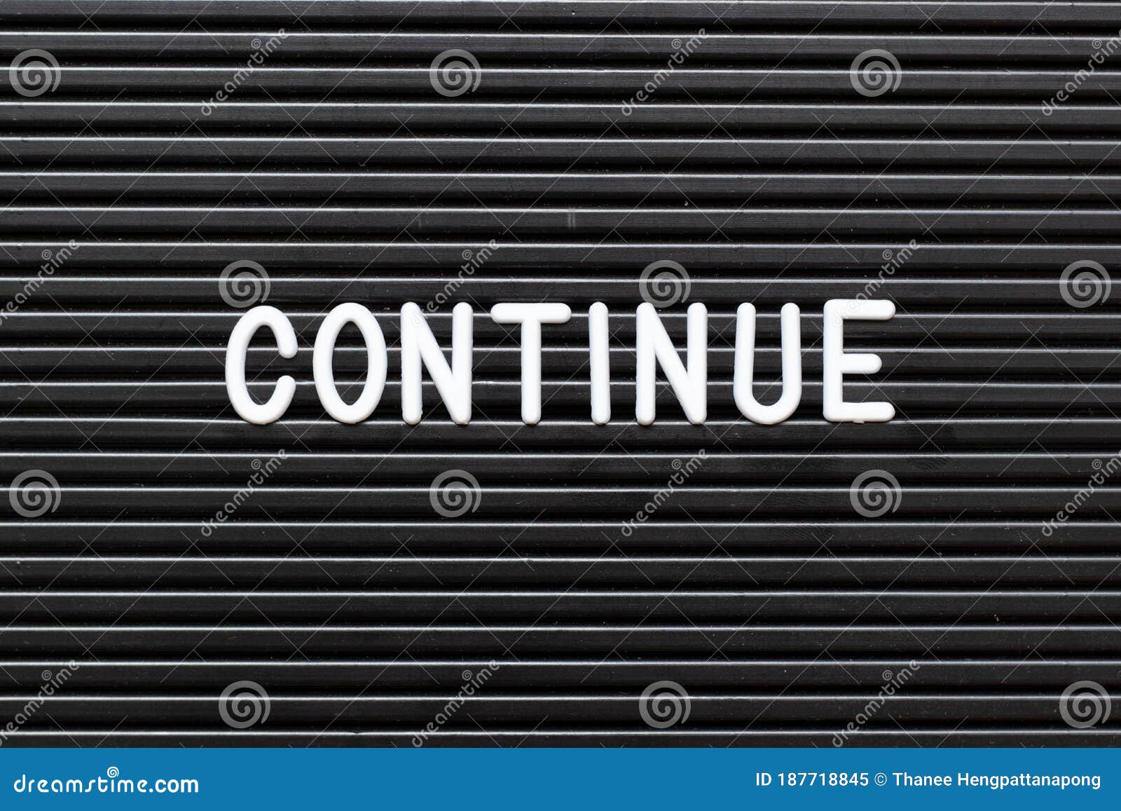 Black Board with White Alphabet in Word Continue Background Stock Image ...