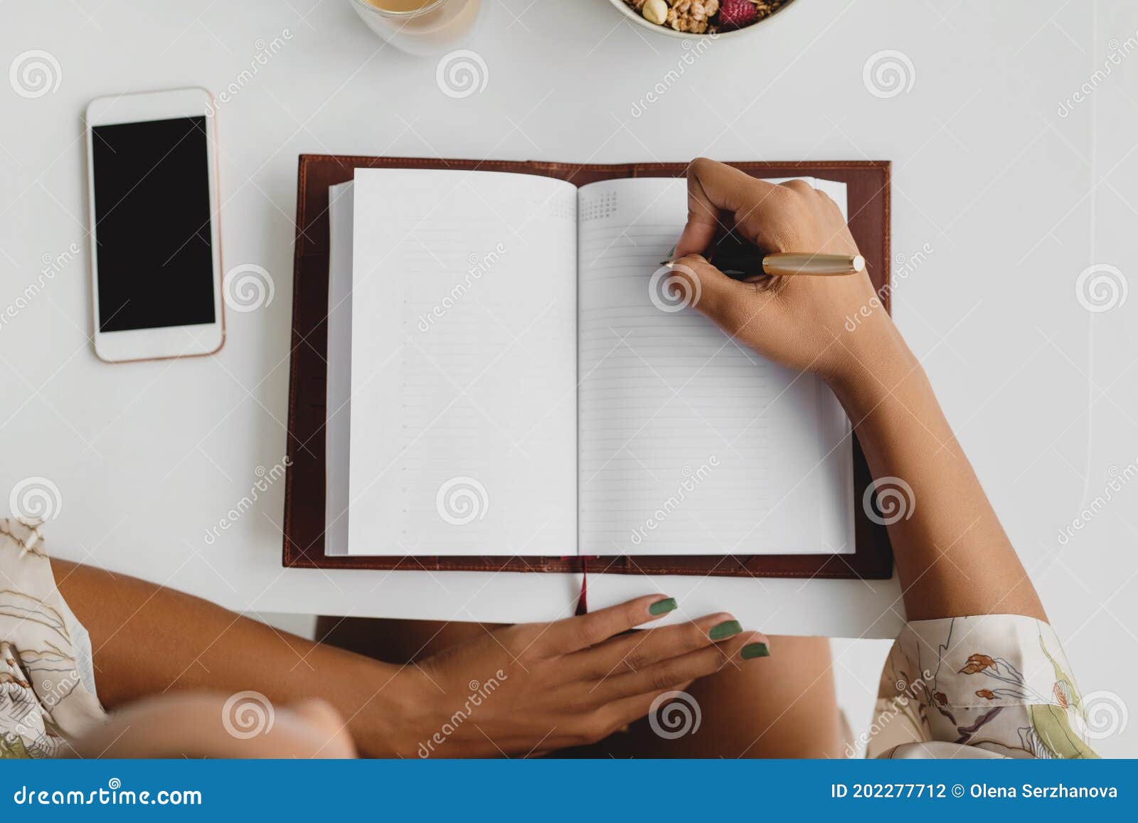 Black Female Hands Making Notes in Notebook during Breakfast on White ...
