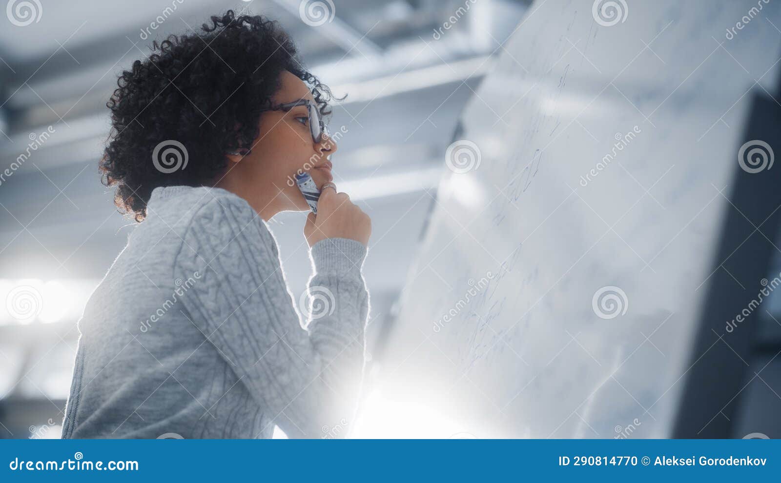 Black Female Scientist Solving Problems and Writing Complicated Math ...