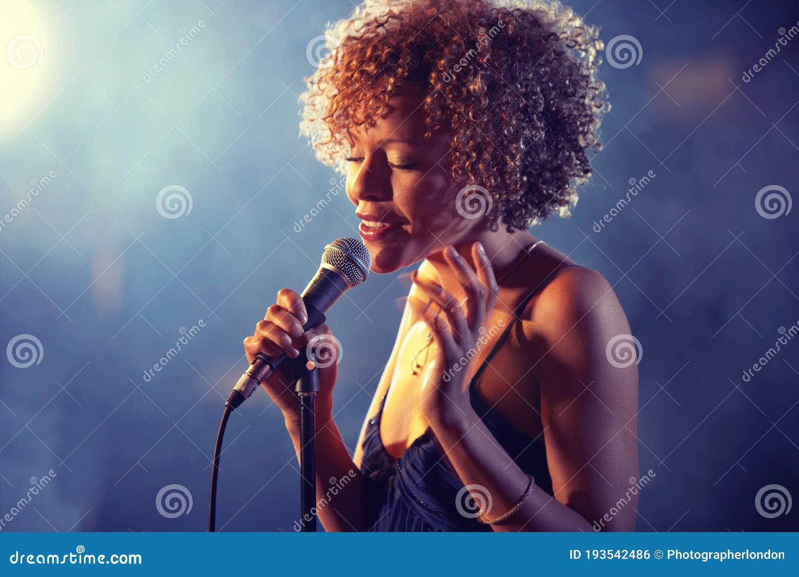 Singer Performing Song Firely On Stage Closeup. Silhouette Unknown Man ...