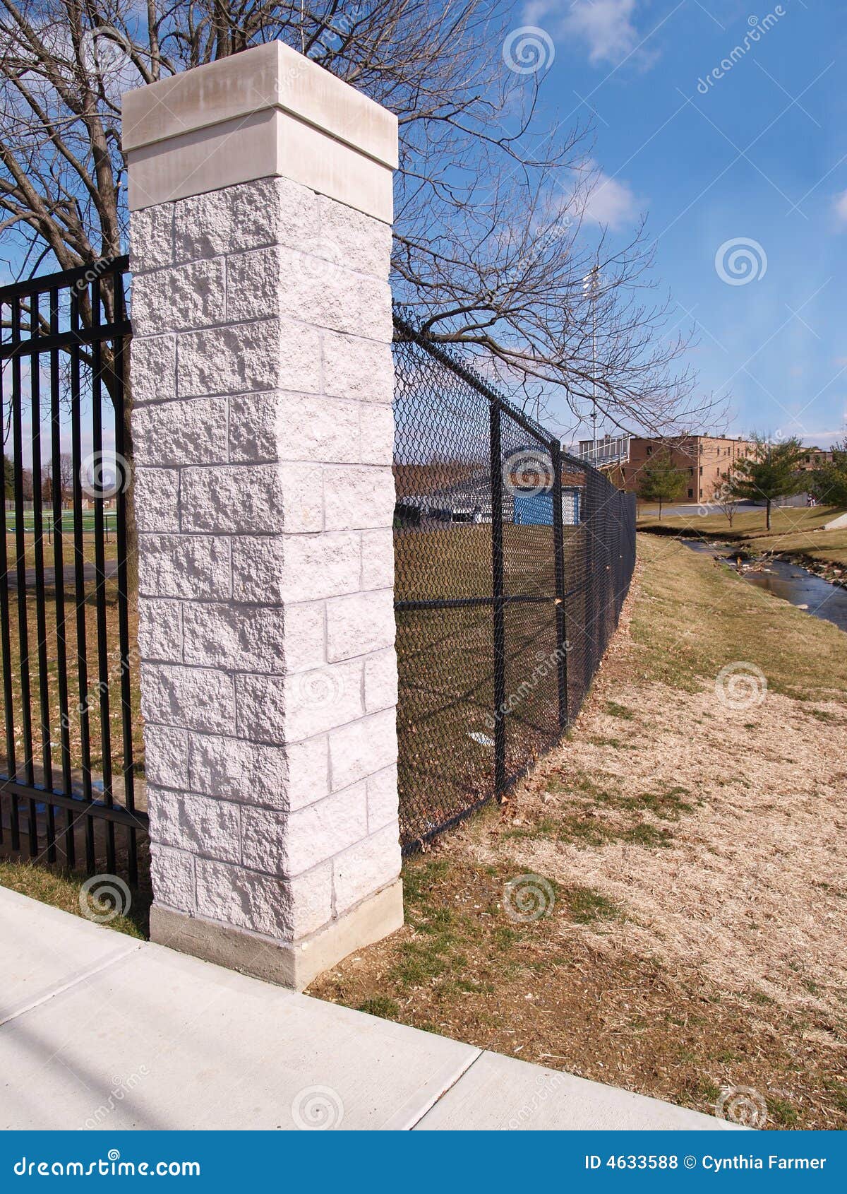 Black Fence and Cornerstone Stock Photo - Image of metal, block: 4633588