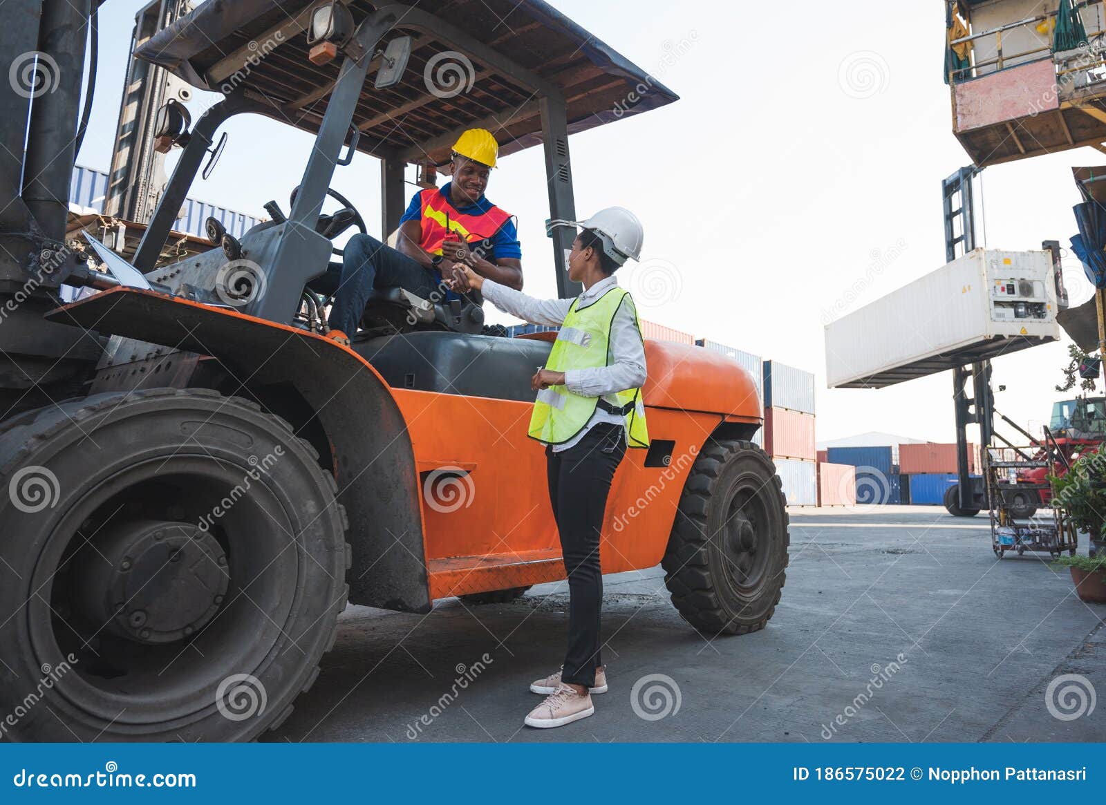 Black Foreman Worker Working Control The Crane And Forklift At ...