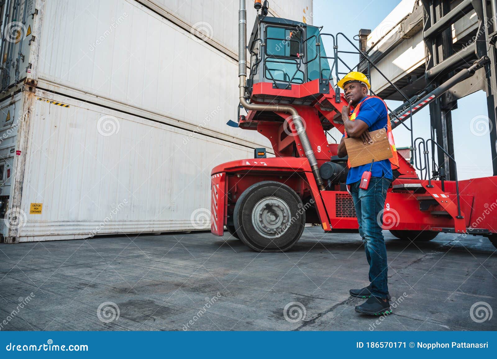 Black Foreman Worker Working Control The Crane And Forklift At ...
