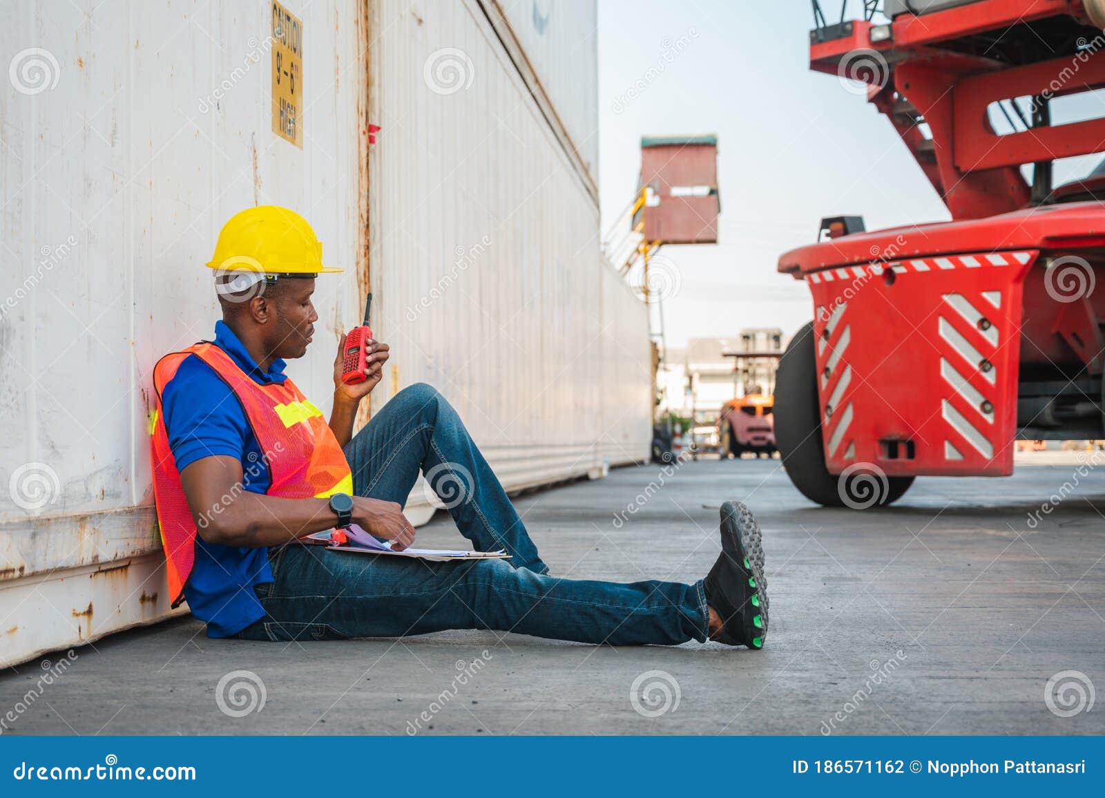 Black Foreman Worker Working Control the Crane and Forklift at ...
