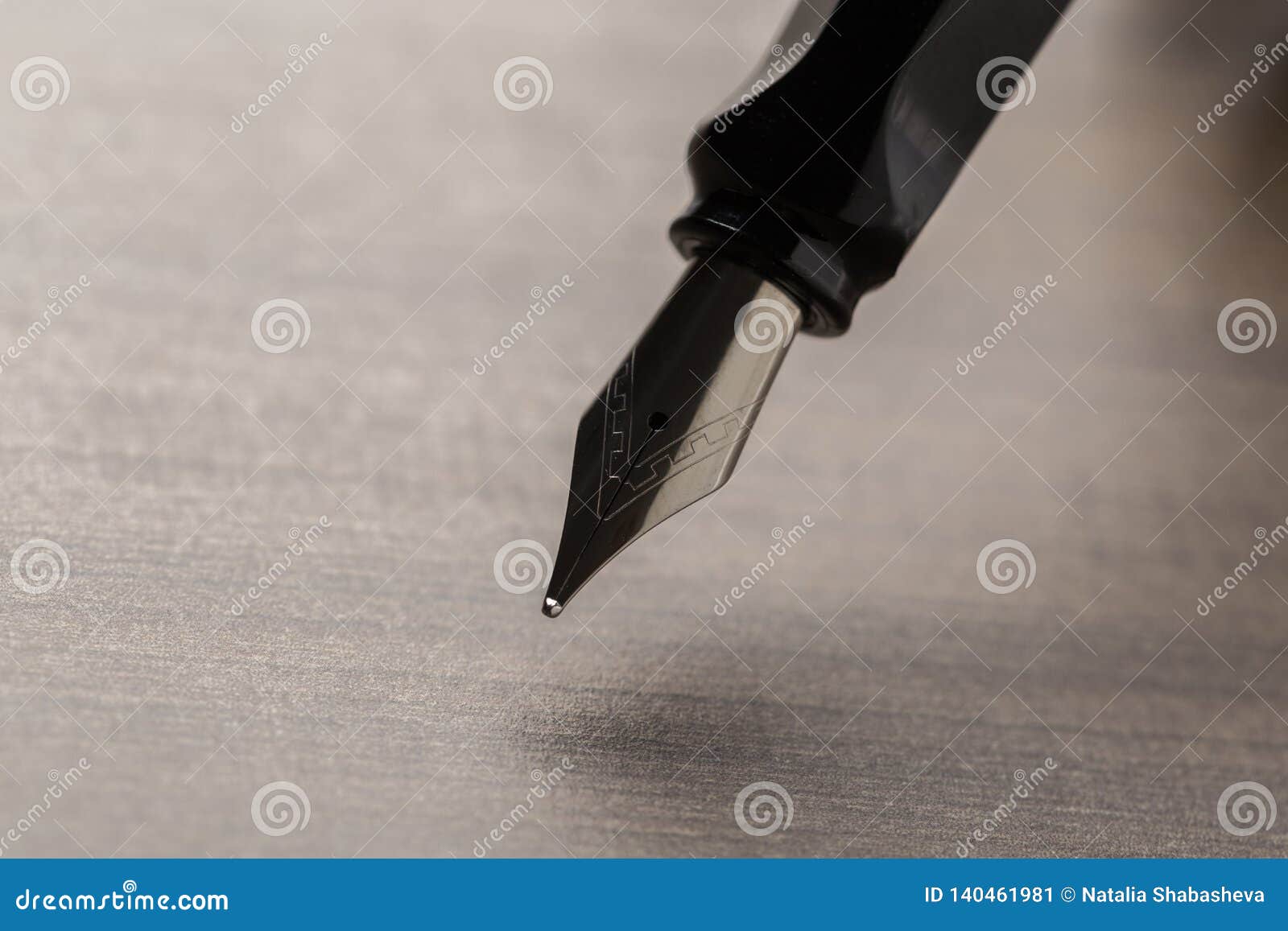 Black Fountain Pen on Table Stock Image - Image of silver ...