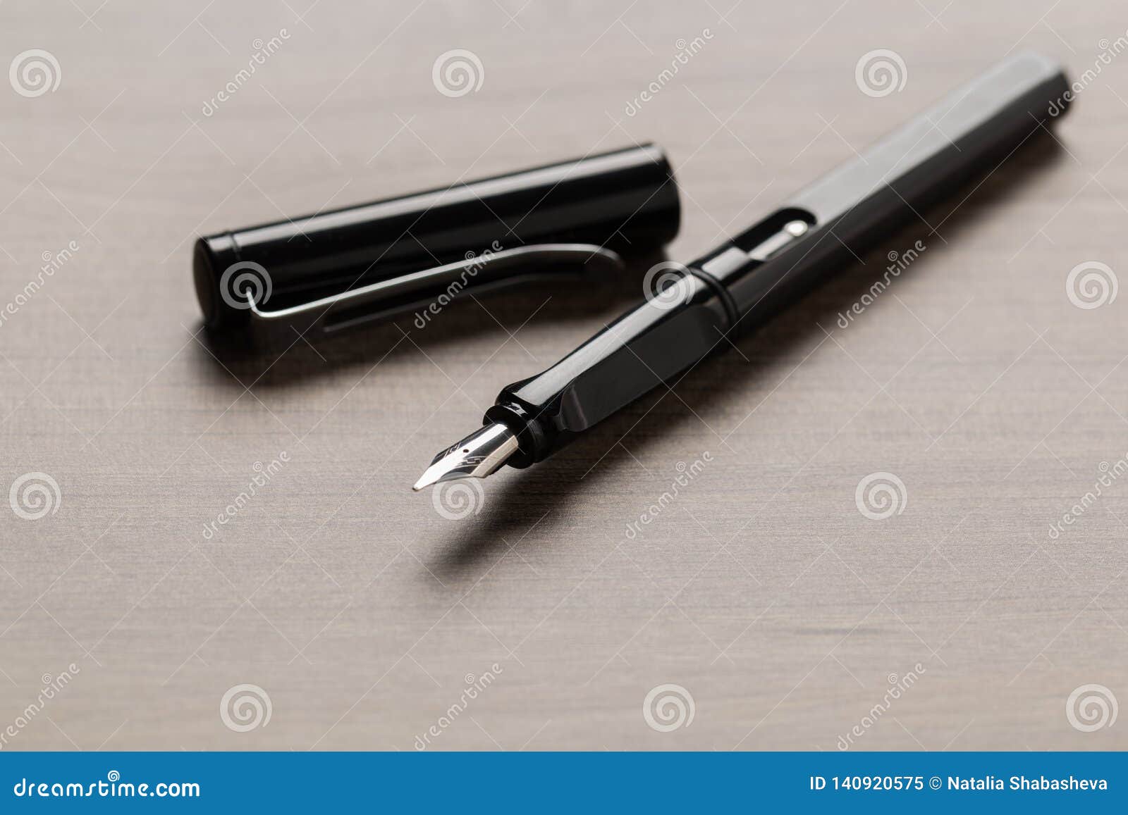 Black Fountain Pen on Table Stock Image - Image of shiny, fountain ...