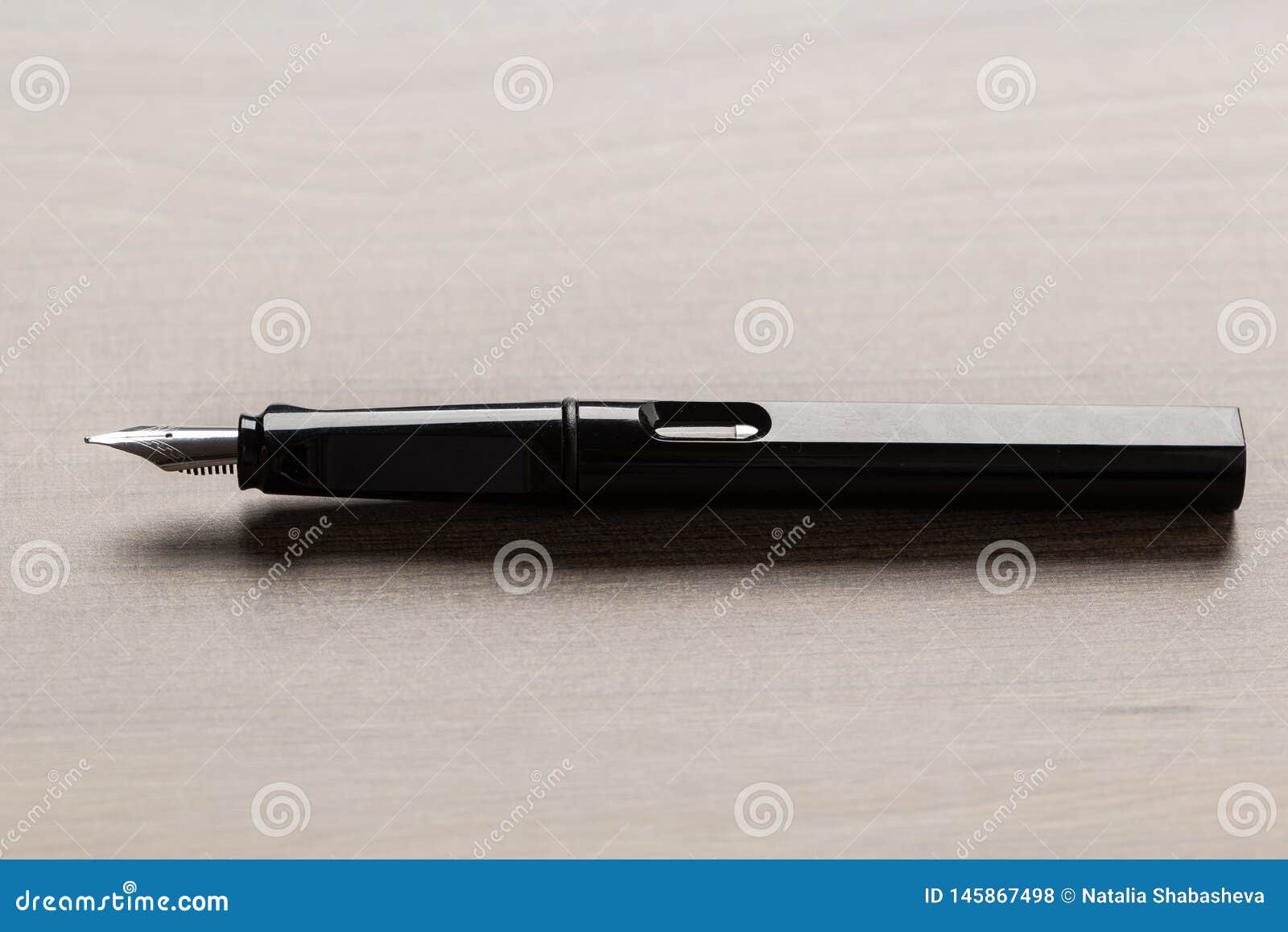 Black Fountain Pen on Table Stock Photo - Image of paper, silver: 145867498