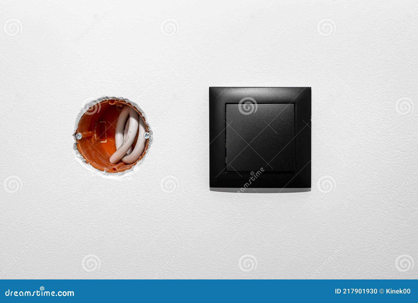 A Black Frame with a Button To Switch the Light Switch and an Orange ...