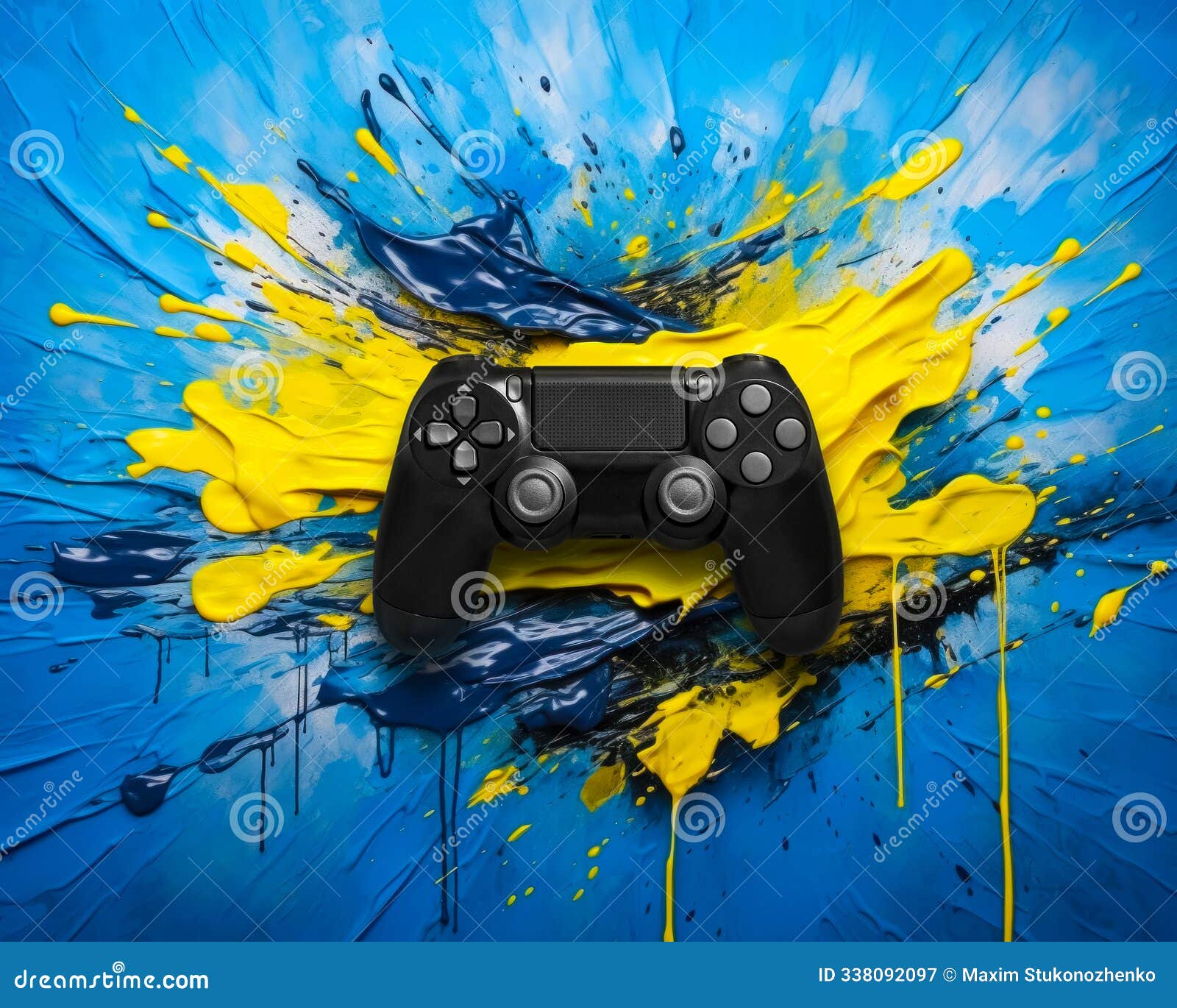 Black Game Controller on Vibrant Blue and Yellow Paint Splash ...