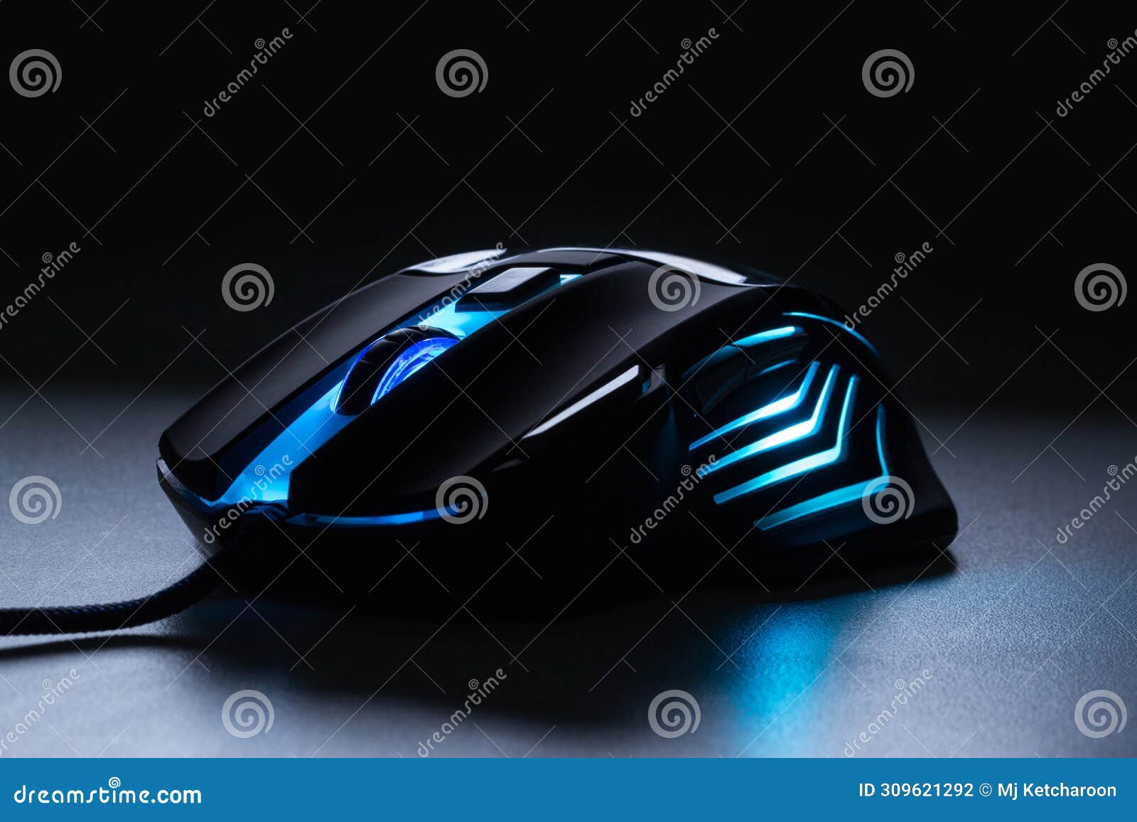 Black Gaming Mouse with Light Blue Light Stock Photo - Image of gamer ...