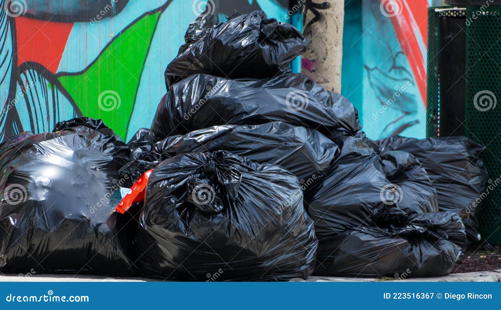 BLACK GARBAGE BACK stock image. Image of wall, trash - 223516367