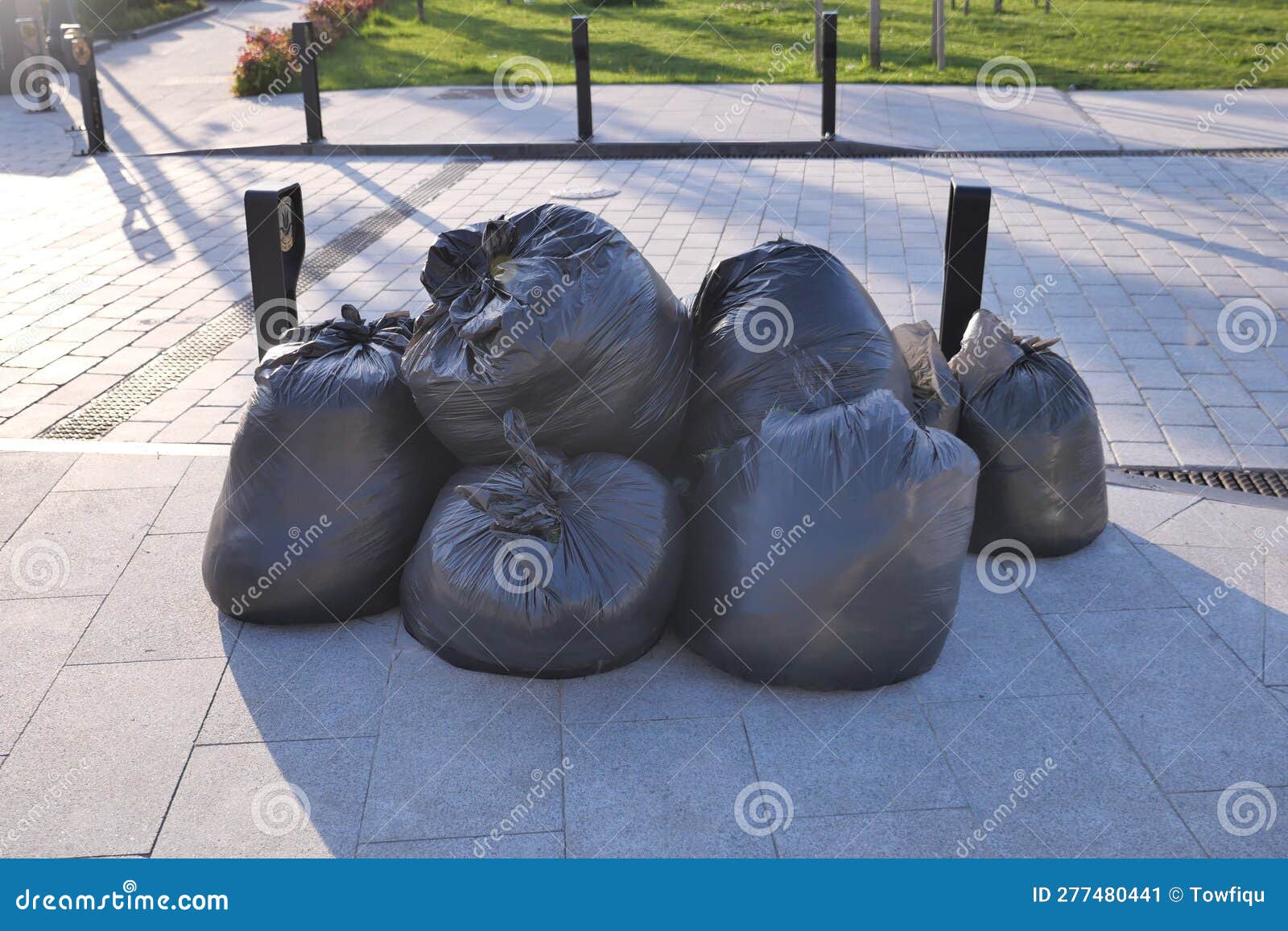 Black Garbage Bags Stack on a Park Stock Image - Image of pile ...