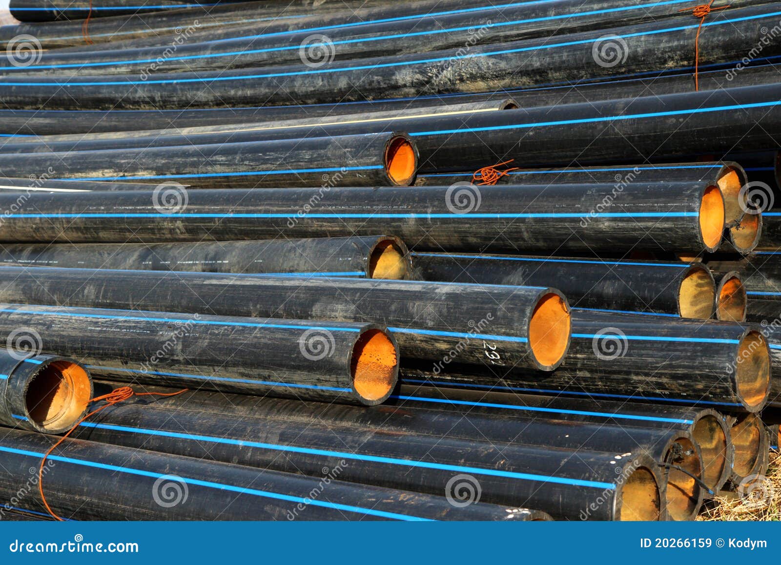 Black gas pipe on a pile stock image. Image of circle - 20266159