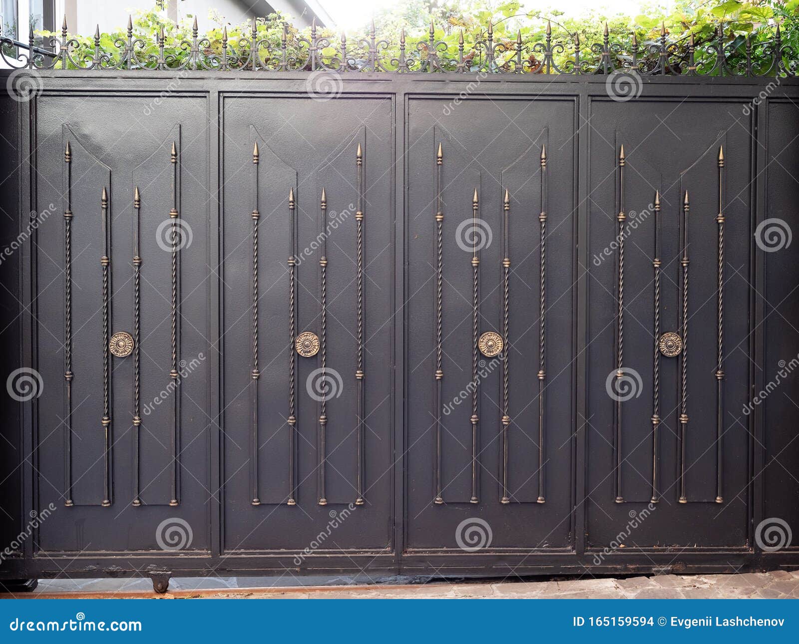 Black Roller Gates with Forging Elements Under the Visor Stock Photo ...