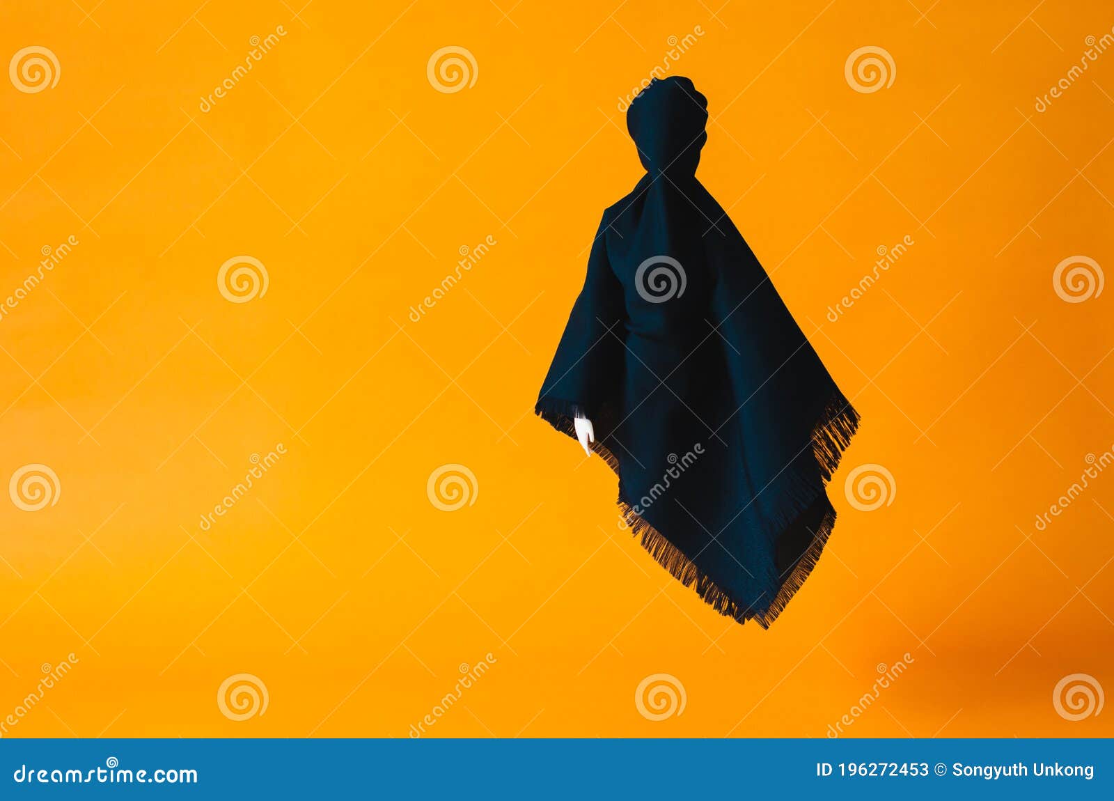 Black Ghost Sheet Flying on Orange Background. Stock Image - Image of ...