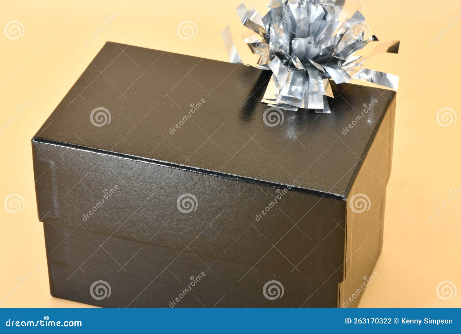 A Black Gift Box with a Silver Bow Stock Photo - Image of room, design ...