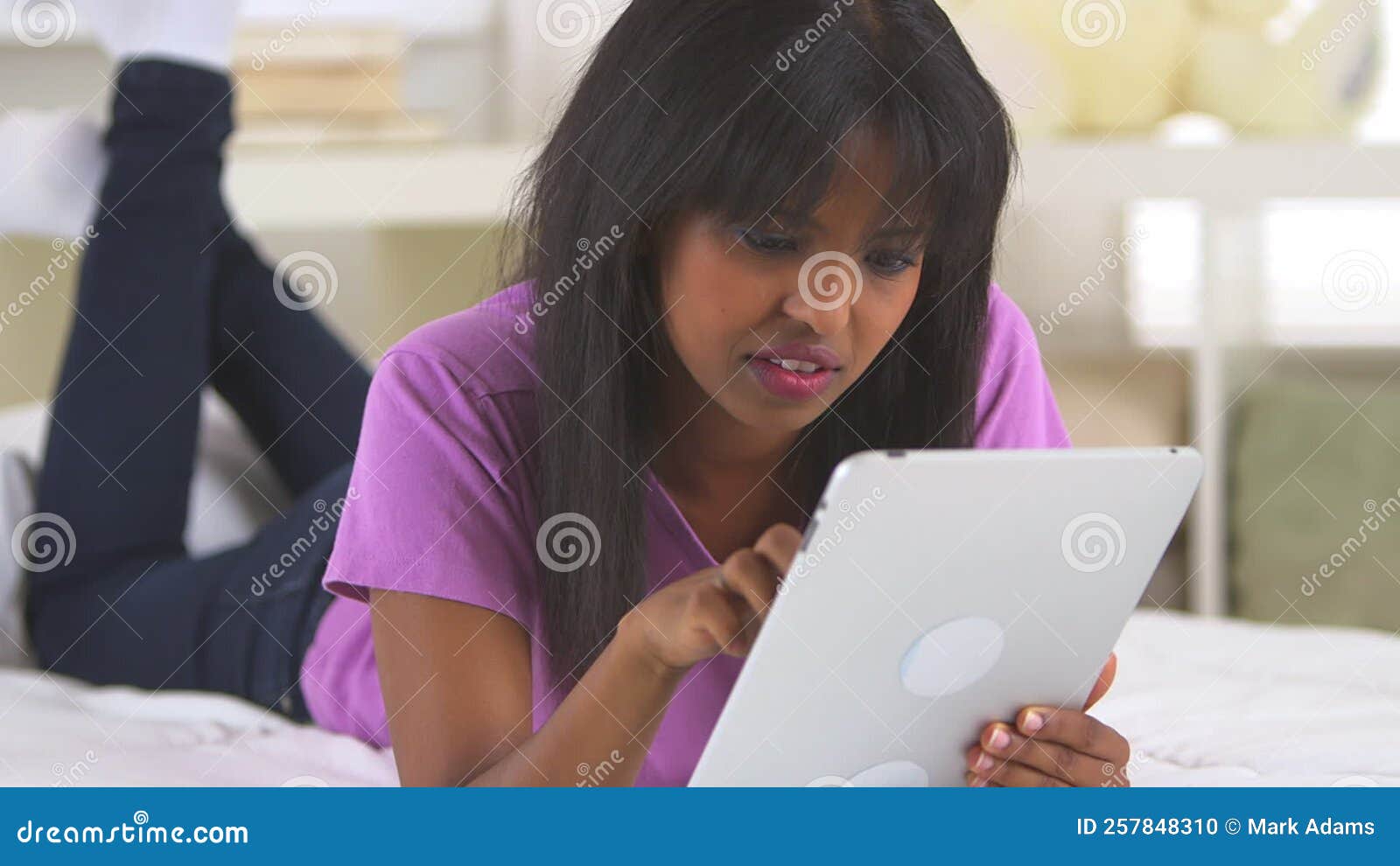 Black Girl Using Tablet Pc in Bed Stock Footage - Video of computer ...