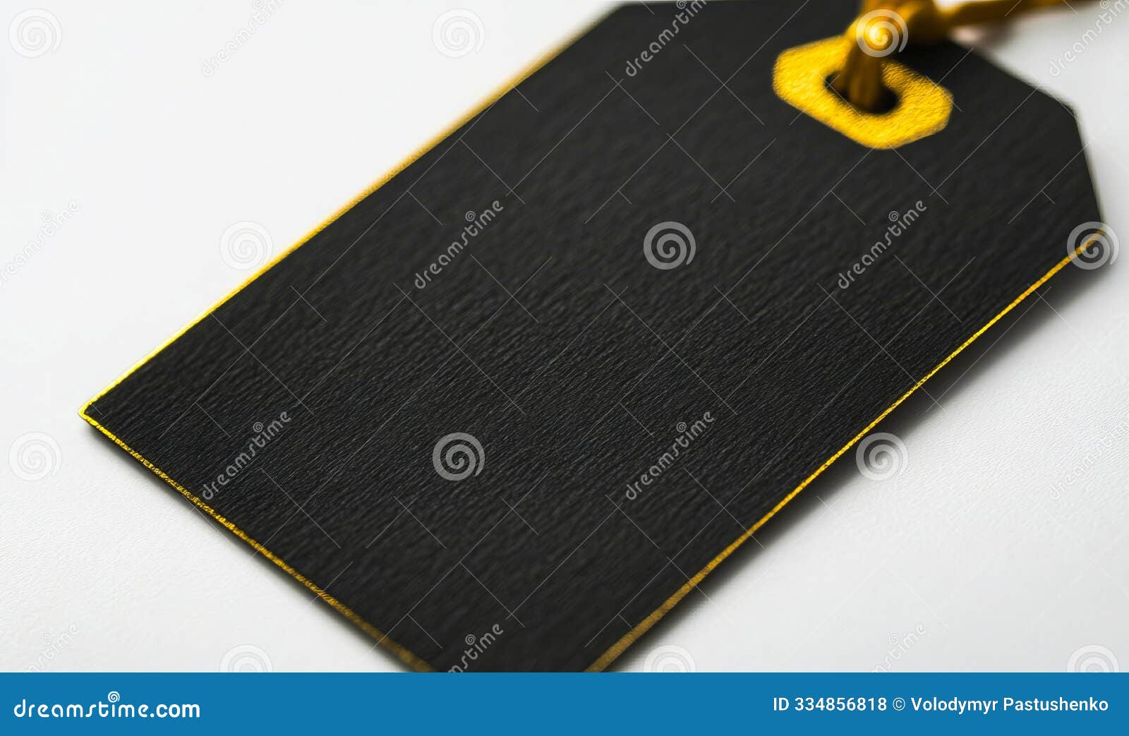 A Black and Gold Price Tag on a White Surface Stock Photo - Image of ...