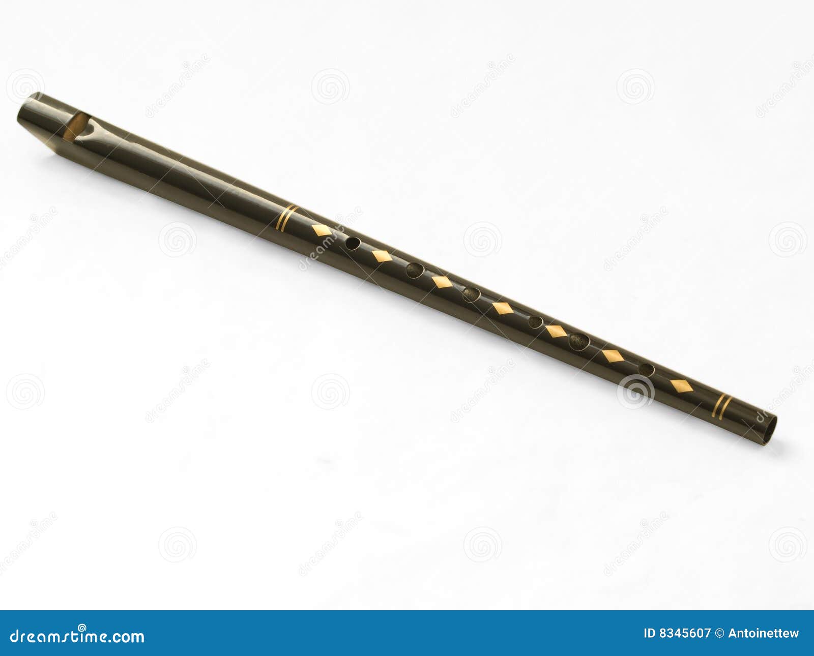 A Black And Golden Tin Whistle Royalty Free Stock Photography - Image ...