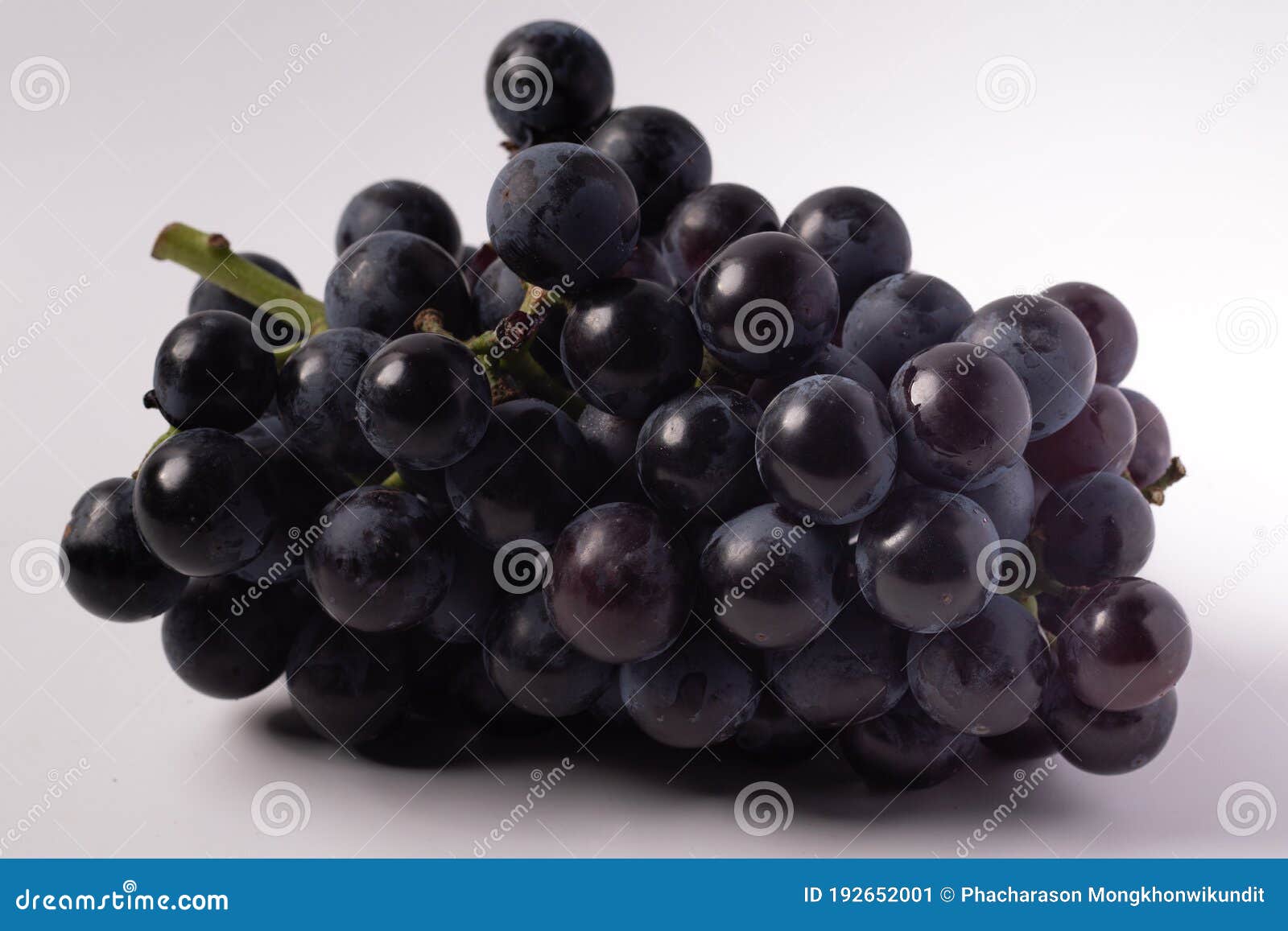 Black Grapes without Seeds in a Rattan Basket. White Background Stock ...