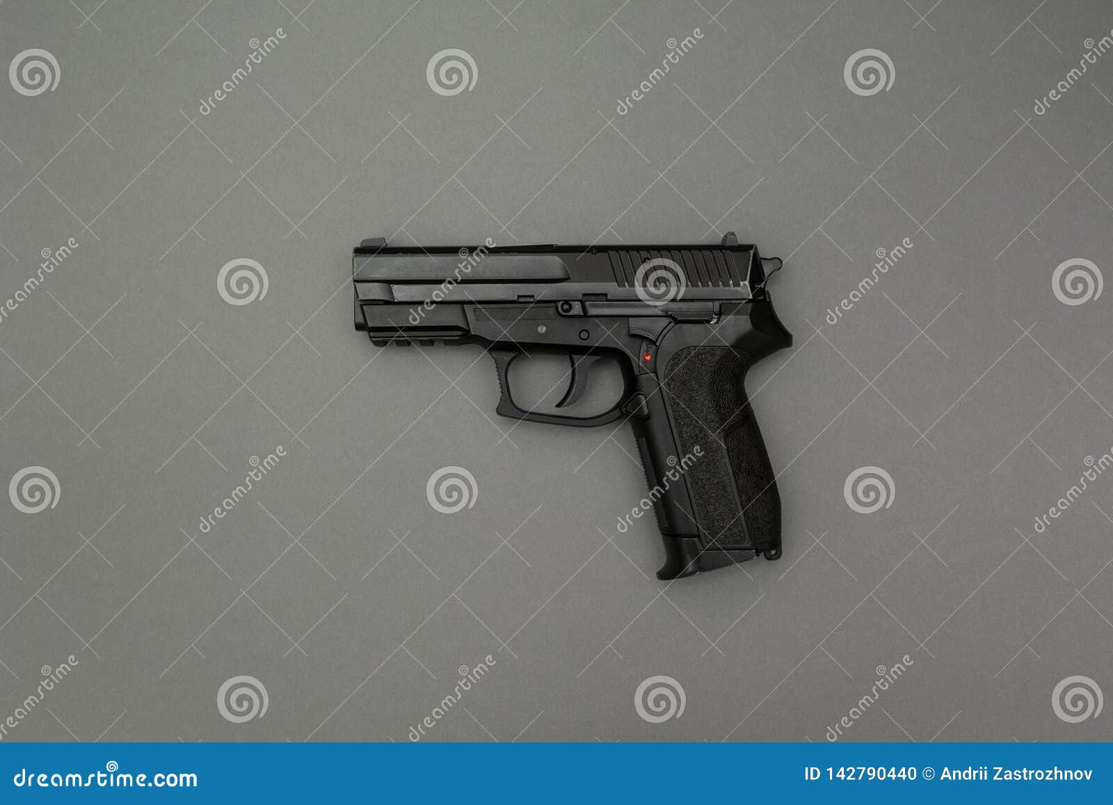 Black Gun on a Gray Background Stock Photo - Image of handgun ...