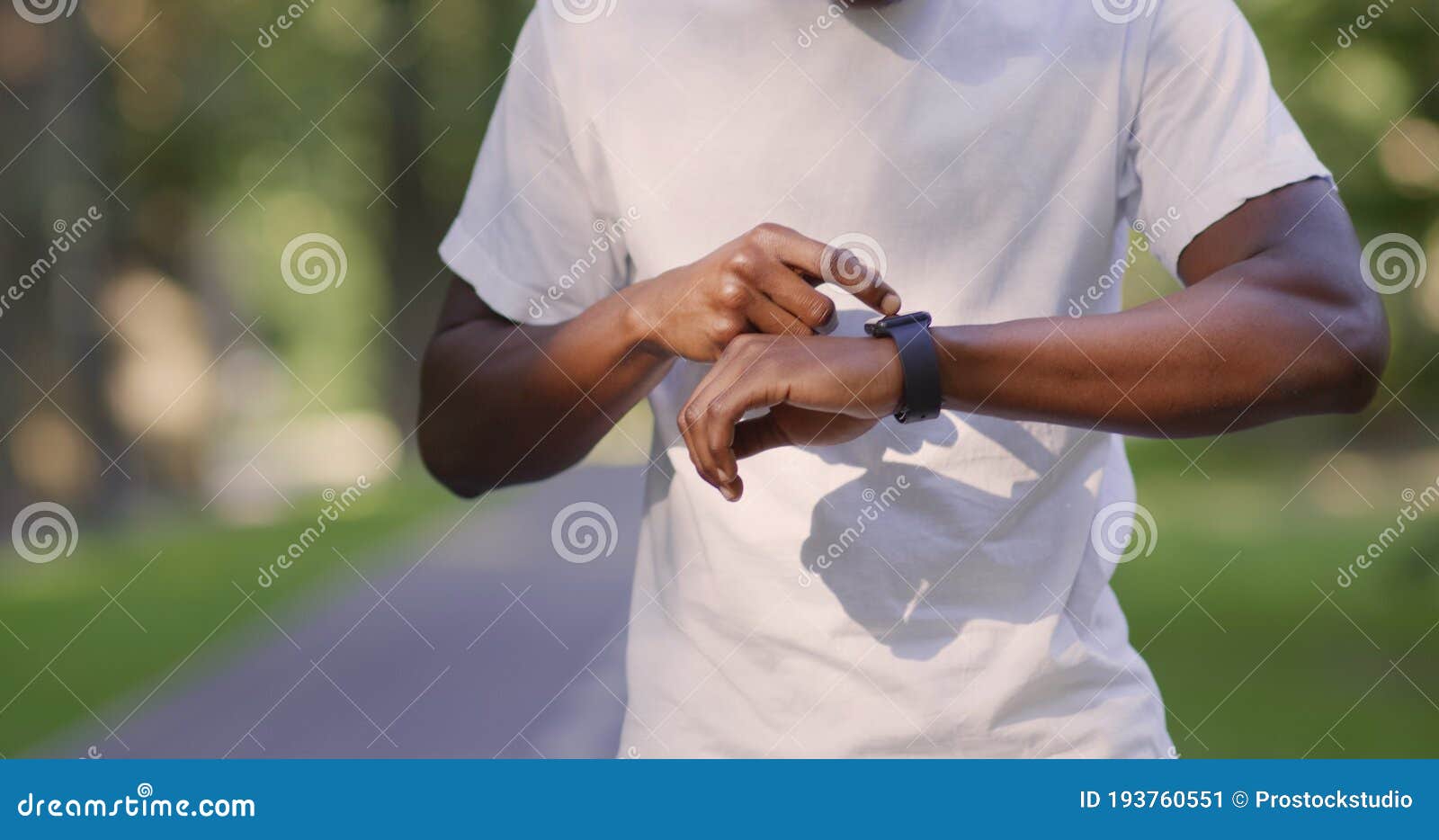 Black Guy Checking His Activity Status on Smartwatch during Run Stock ...