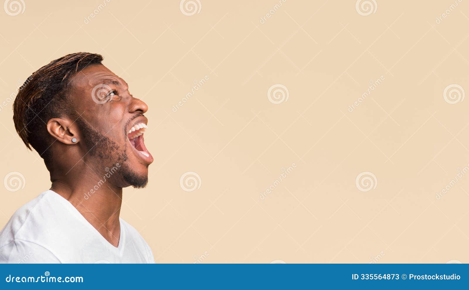 Black Guy Screaming Loudly Standing in Studio, Panorama, Side View ...