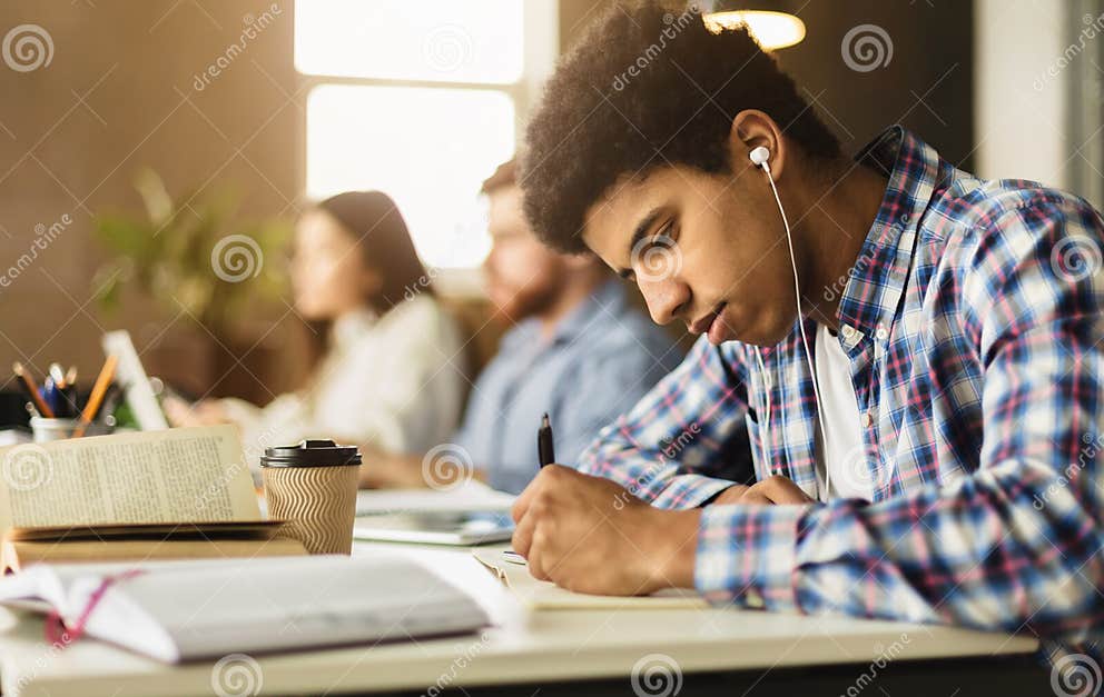 Black Guy Taking Notes, Preparing for Classes in Library Stock Photo ...