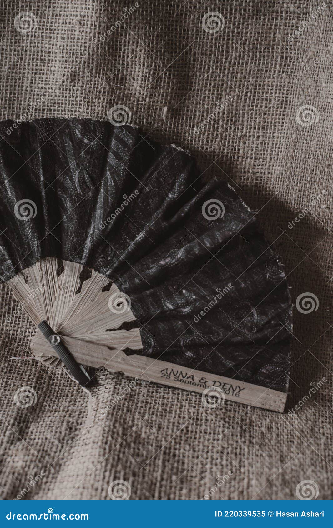 Black Hand Fan on Brown Cloth Stock Image - Image of sketch, leather ...