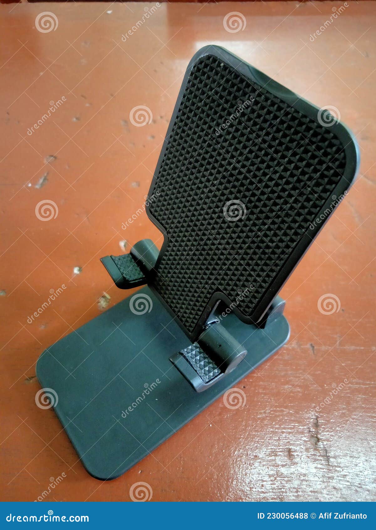 Black hand phone holder stock photo. Image of multimedia - 230056488
