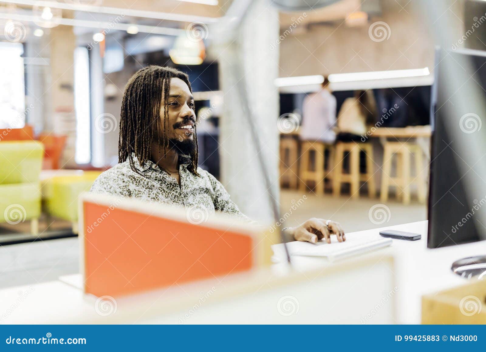 Black Handsome Designer Doing His Work on a Computer Stock Image ...