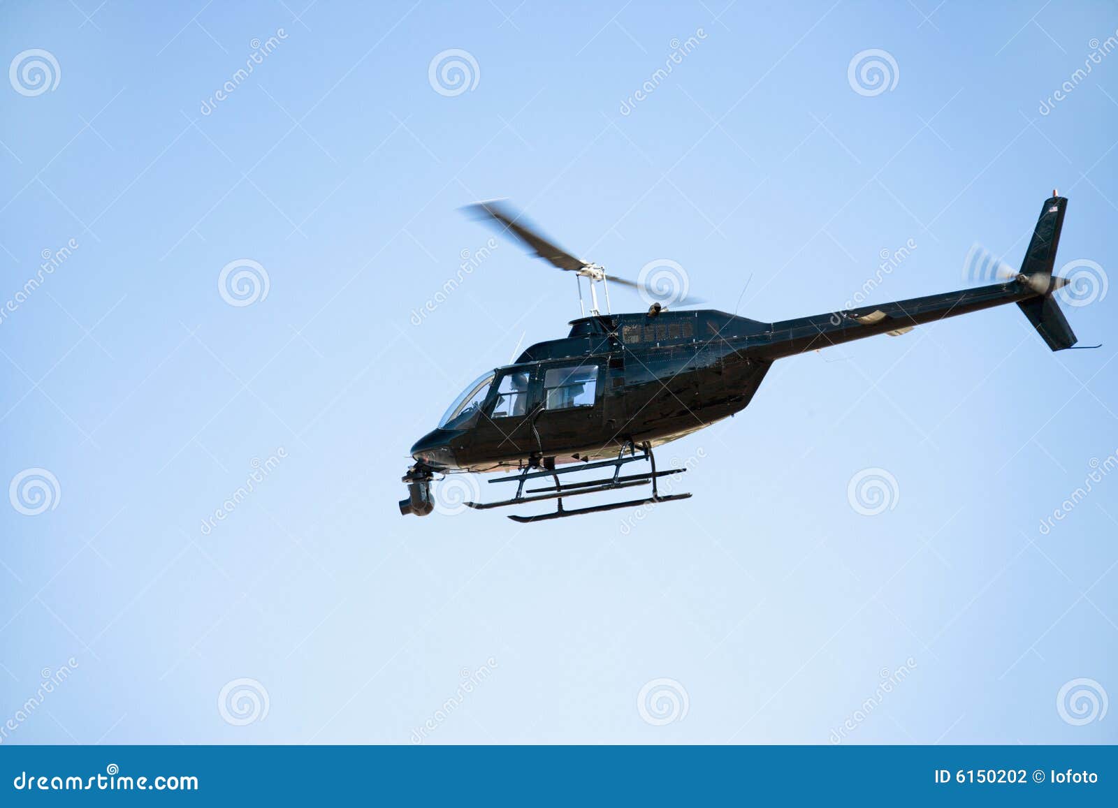 Black Helicopter Flying through the Air. Stock Photo - Image of ...